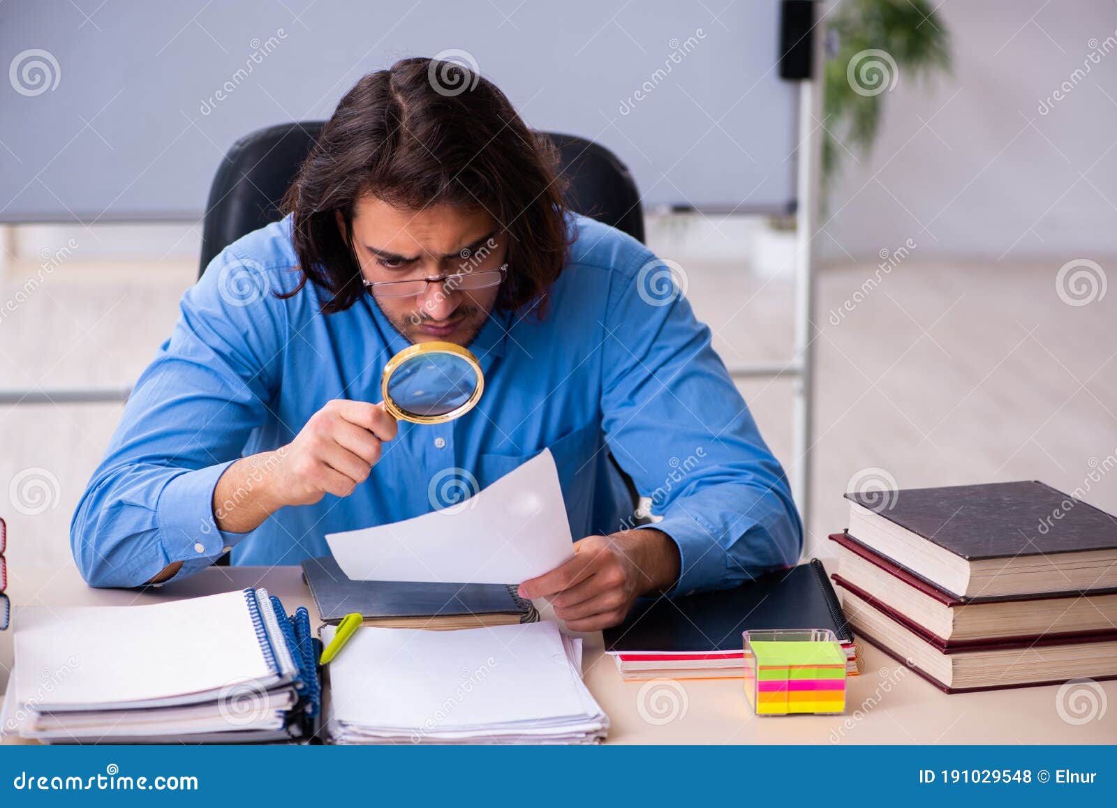Young Male Teacher in the Classroom Stock Photo - Image of lecture ...