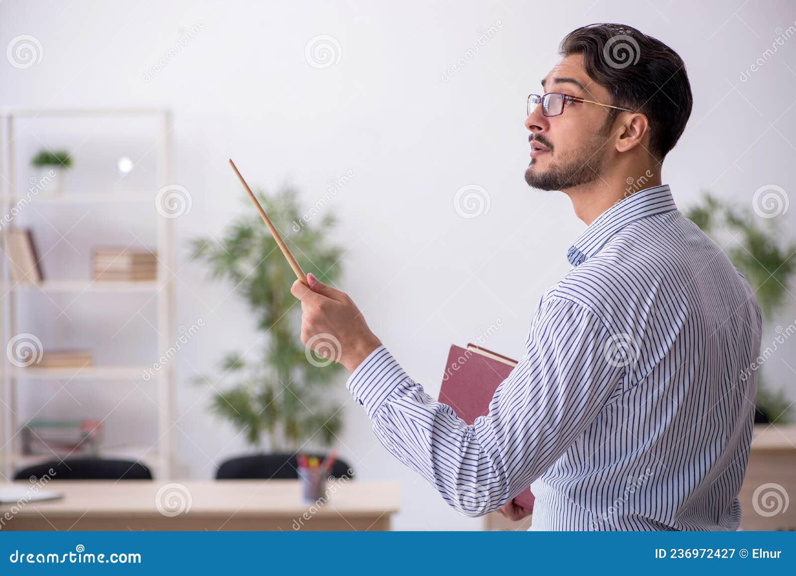 Young Male Teacher in the Classroom Stock Image - Image of learn ...