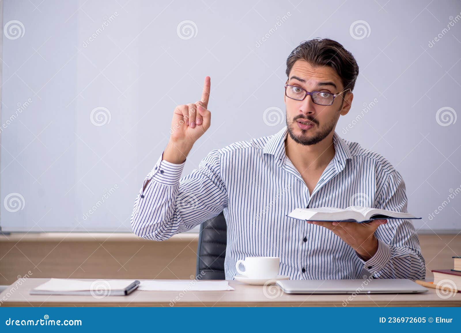 Young Male Teacher in the Classroom Stock Image - Image of teacher ...