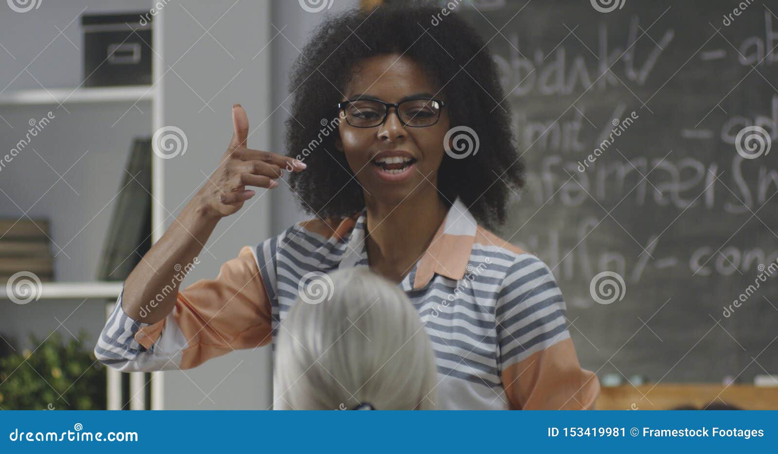 Young Teacher Explaining To a Class Stock Image - Image of class ...