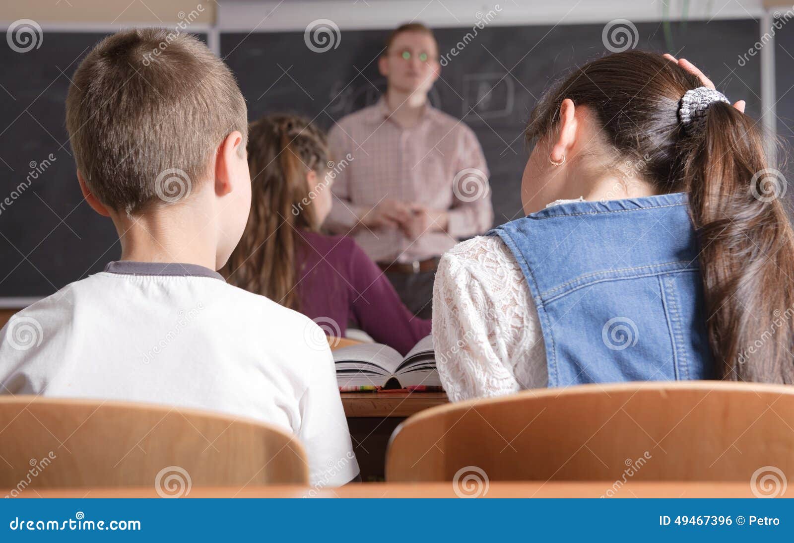 Young Teacher in Front of Class Stock Photo - Image of competition ...