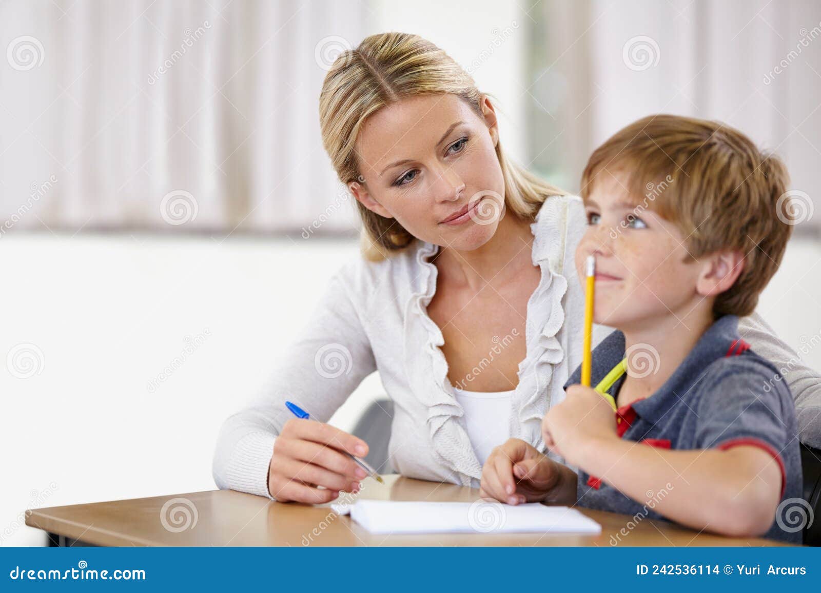 Enriching Eager Young Minds. a Young Teacher in Her Classroom. Stock ...