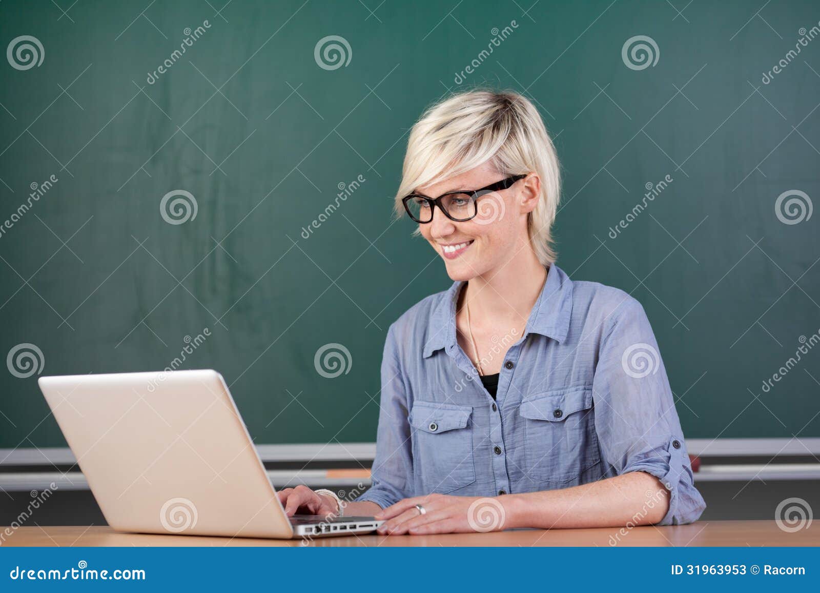Young Teacher with Laptop stock image. Image of education - 31963953