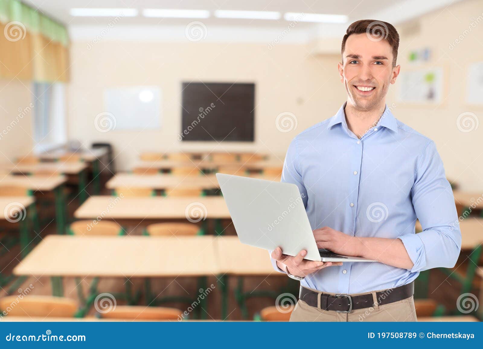 Young Teacher Waiting for Students in Classroom Stock Image - Image of ...