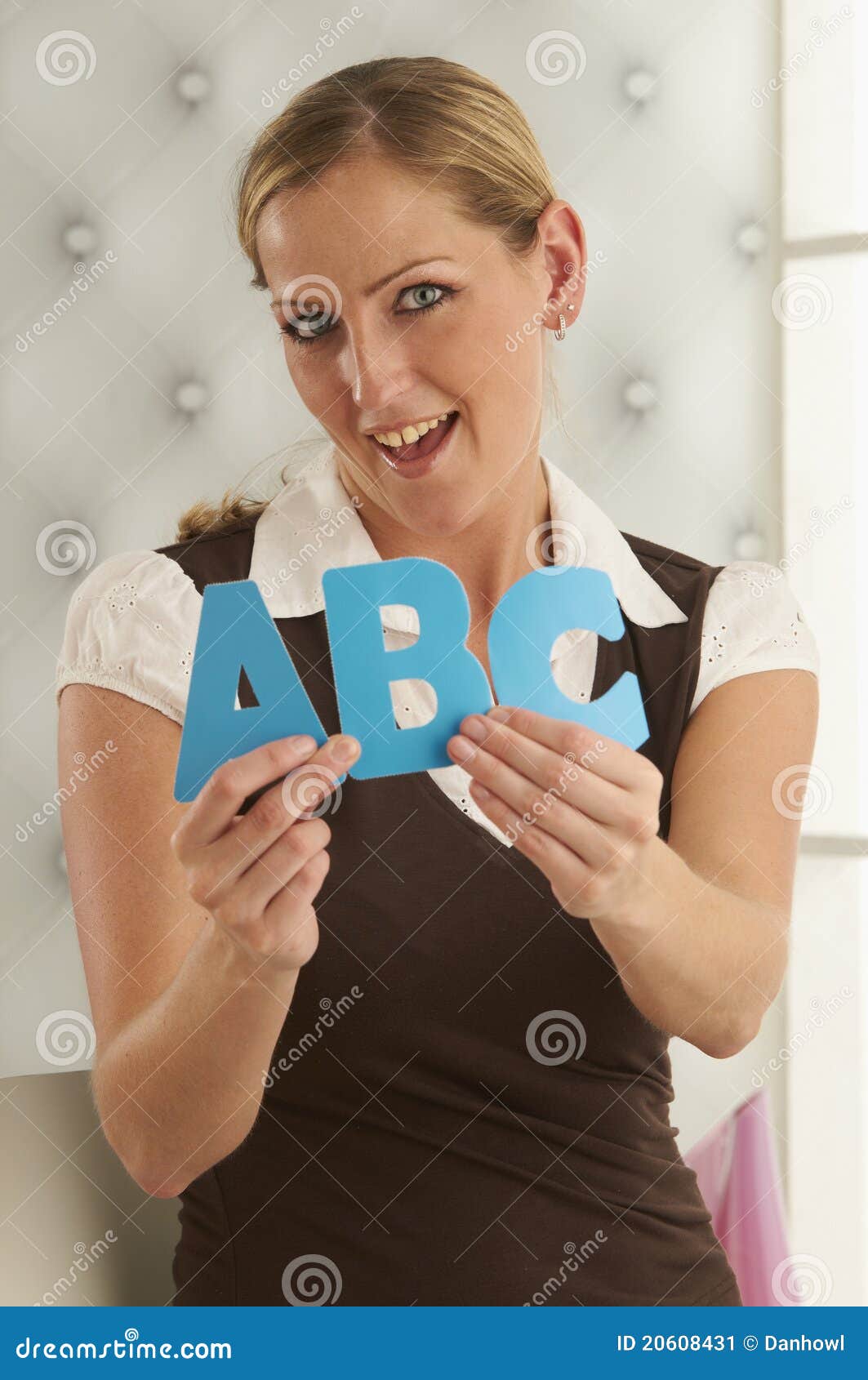 Young Teacher with Letters stock image. Image of caring - 20608431