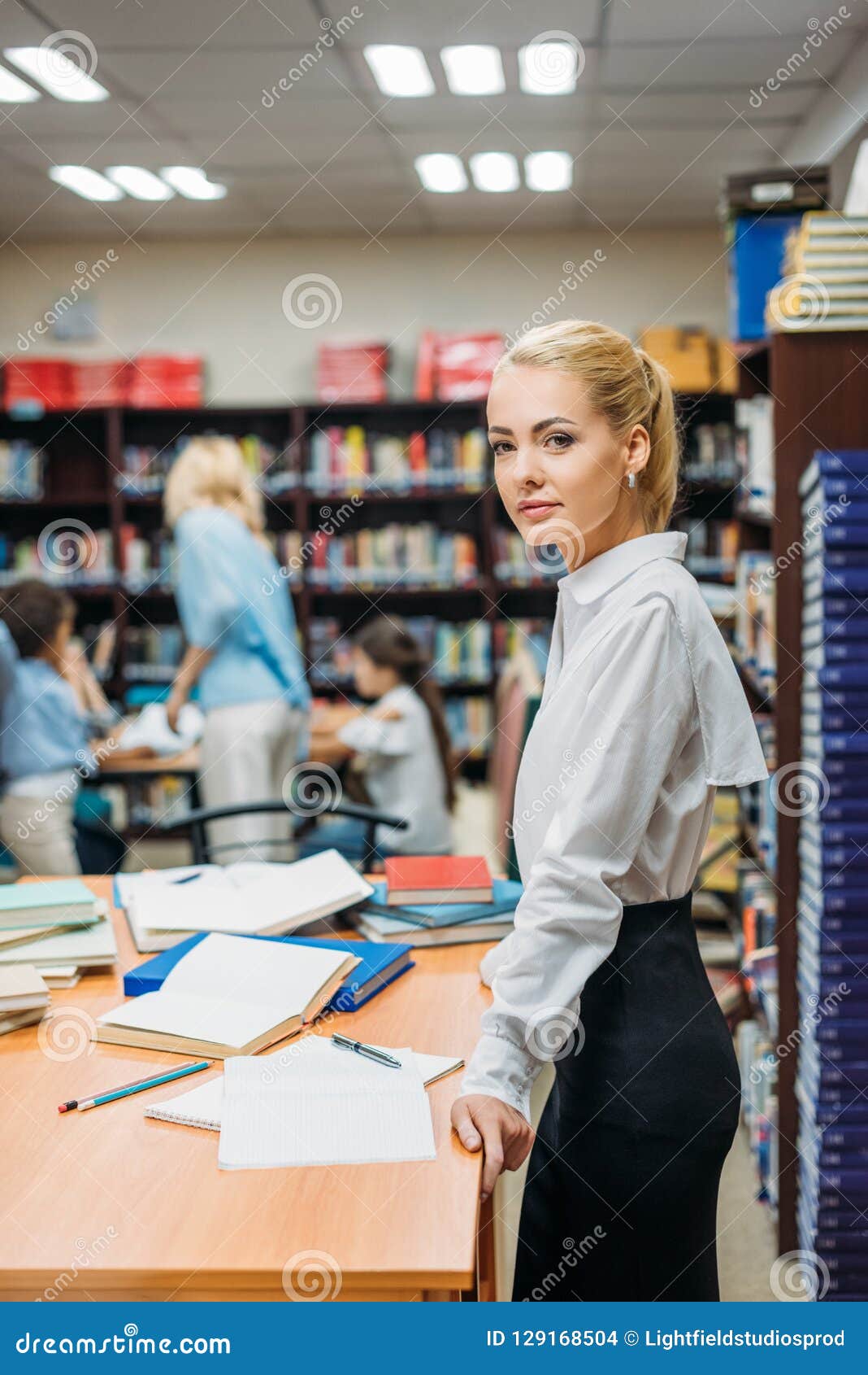 Beautiful Young Teacher in Library Stock Photo - Image of lifestyle ...