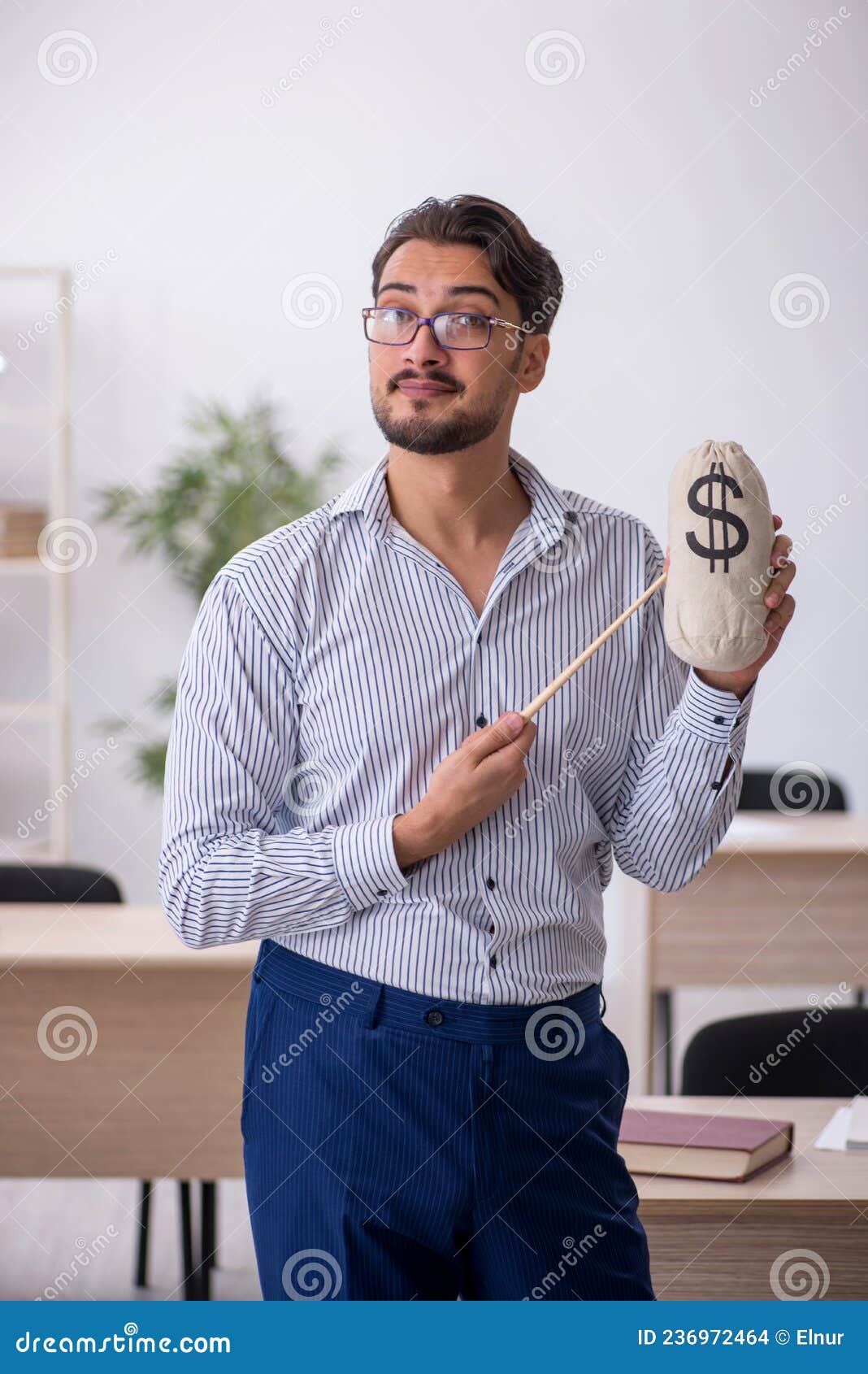 Young Male Teacher in Remuneration Concept Stock Photo - Image of ...