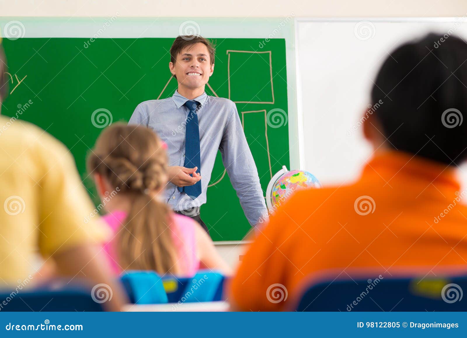 Young teacher stock image. Image of elementary, lesson - 98122805