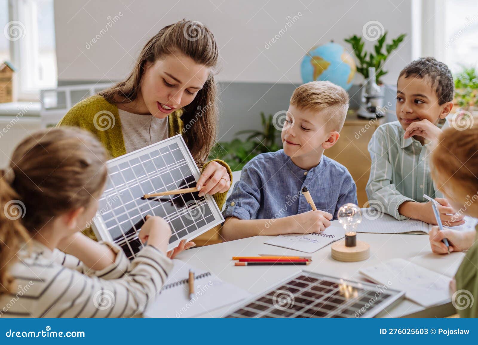 Young Teacher with Solar Panel Learning Pupils about Solar Energy ...