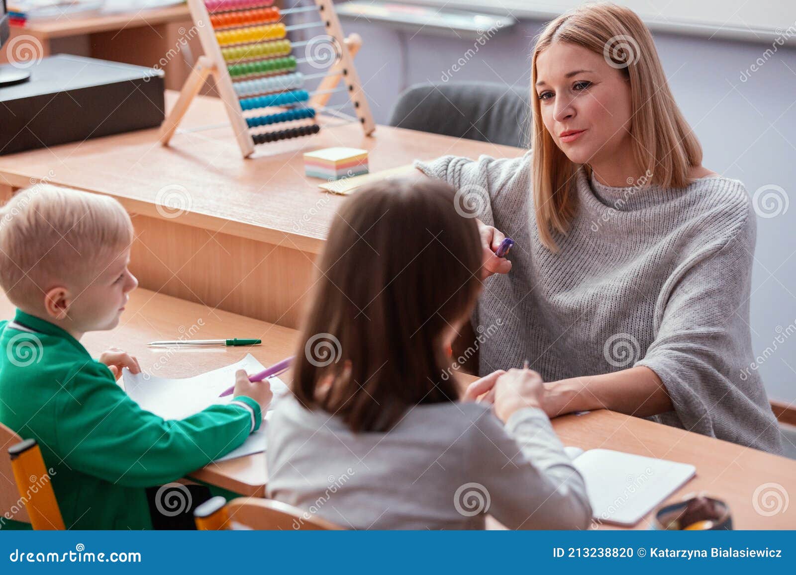 Teacher and Student in the Classroom during the First Maths Lesson ...
