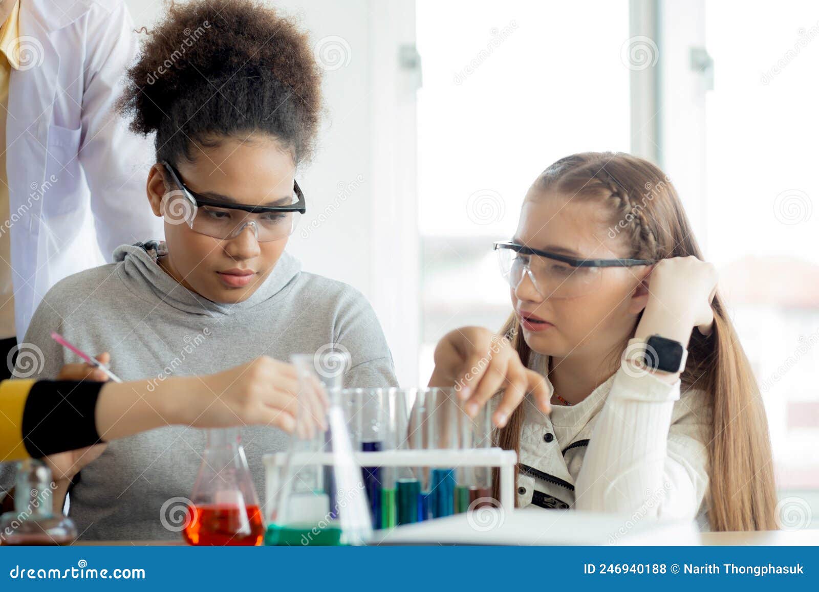 Young Teacher Teaching Group Student about Science and Test Chemical ...