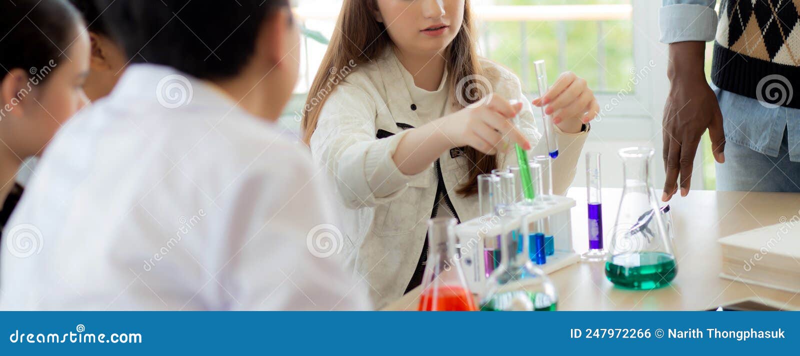 Young Teacher Teaching Group Student about Science and Test Chemical ...