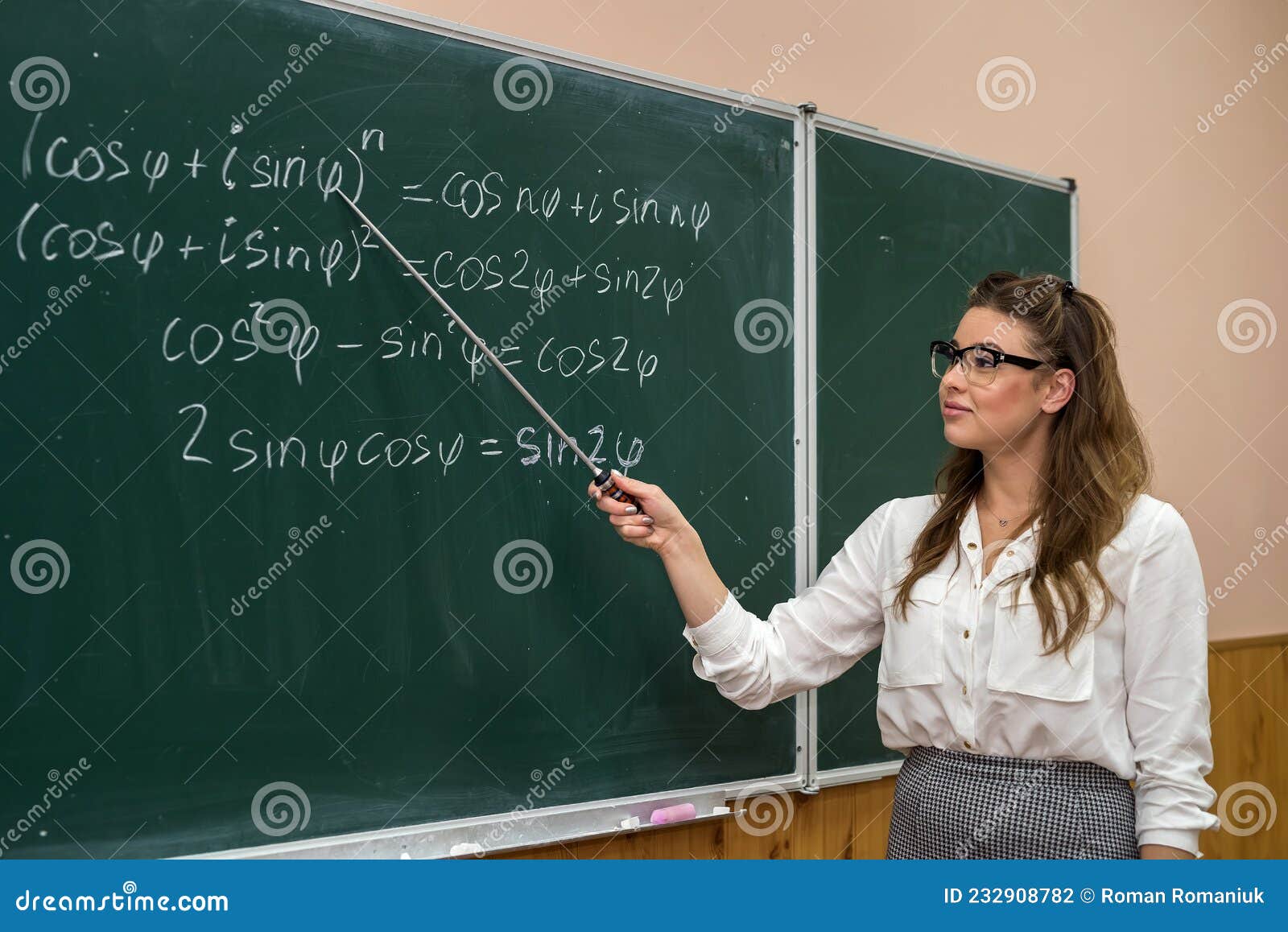Young Teacher Writing and Explain the Mathematical Formulas on a ...