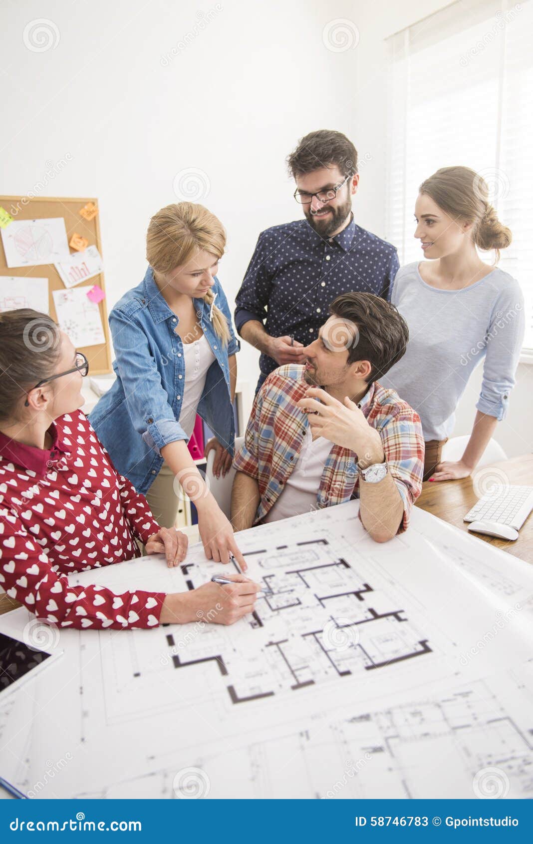Young team of architects stock image. Image of brainstorming - 58746783