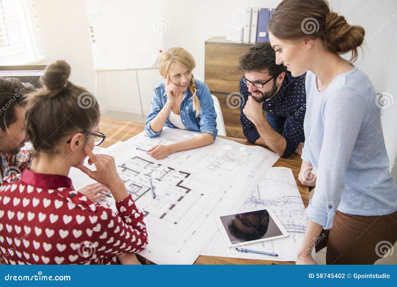 Young team of architects stock photo. Image of cooperation - 58745402
