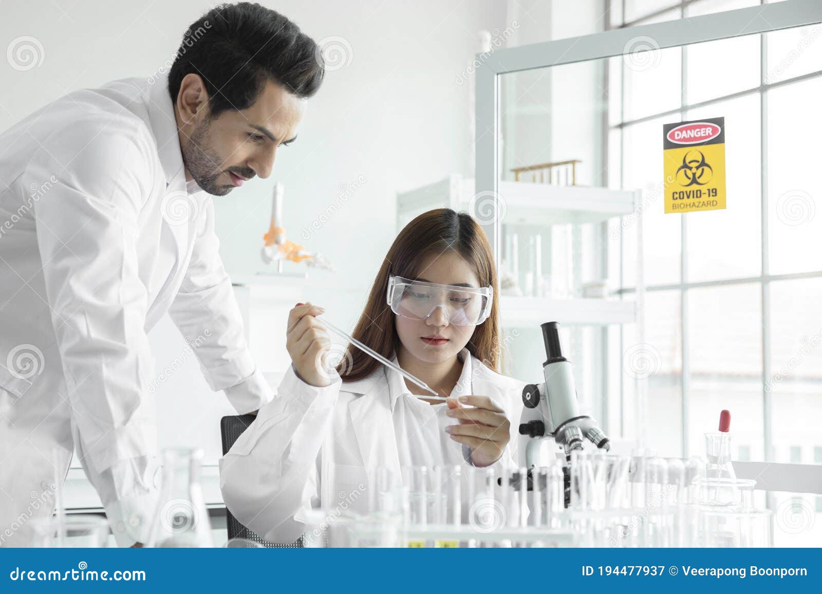 Young Team Scientist Medical Worker in Lab , Doing a Analysis in a ...