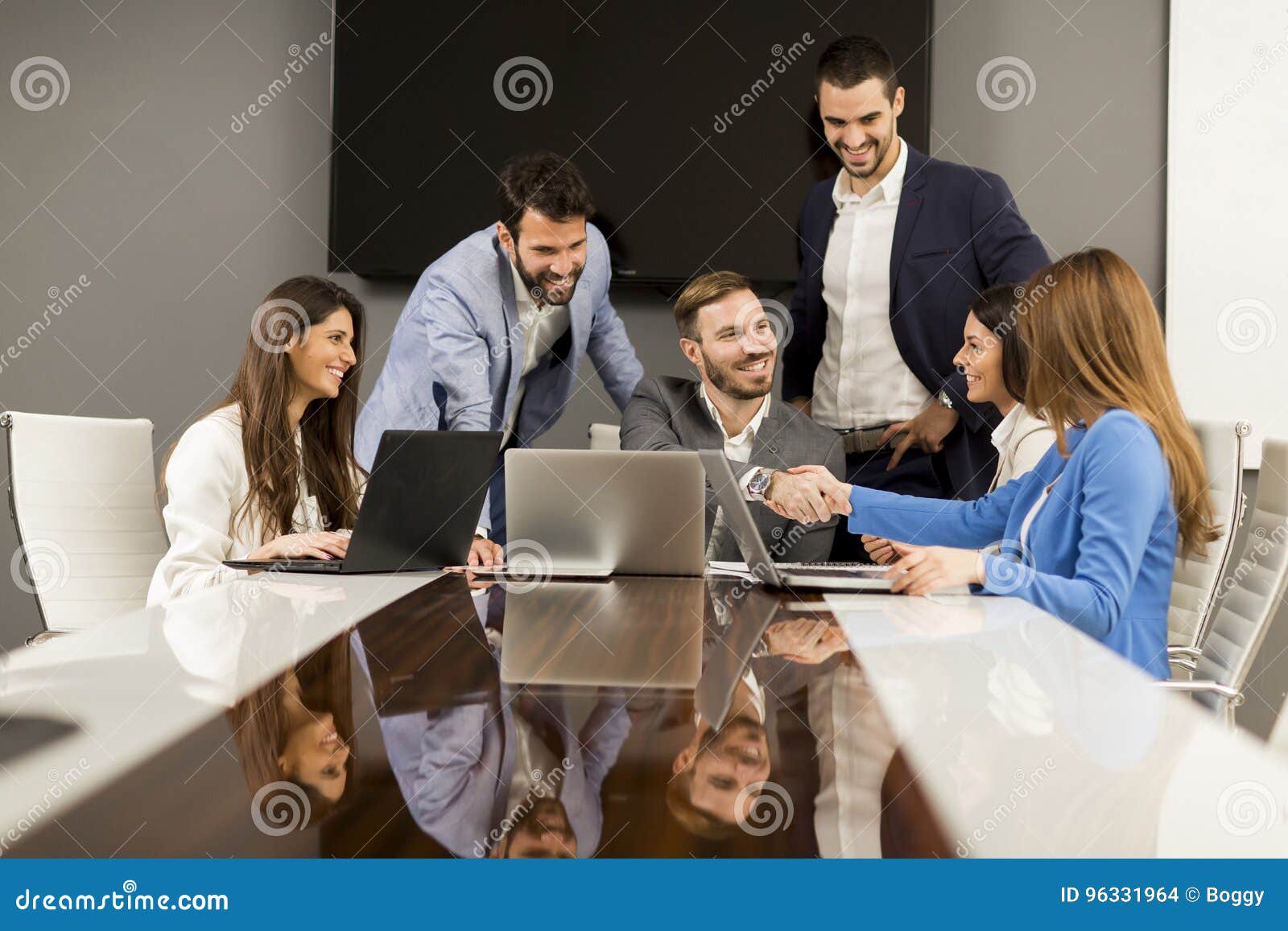 Young Teamwork in the Office Stock Photo - Image of women, person: 96331964