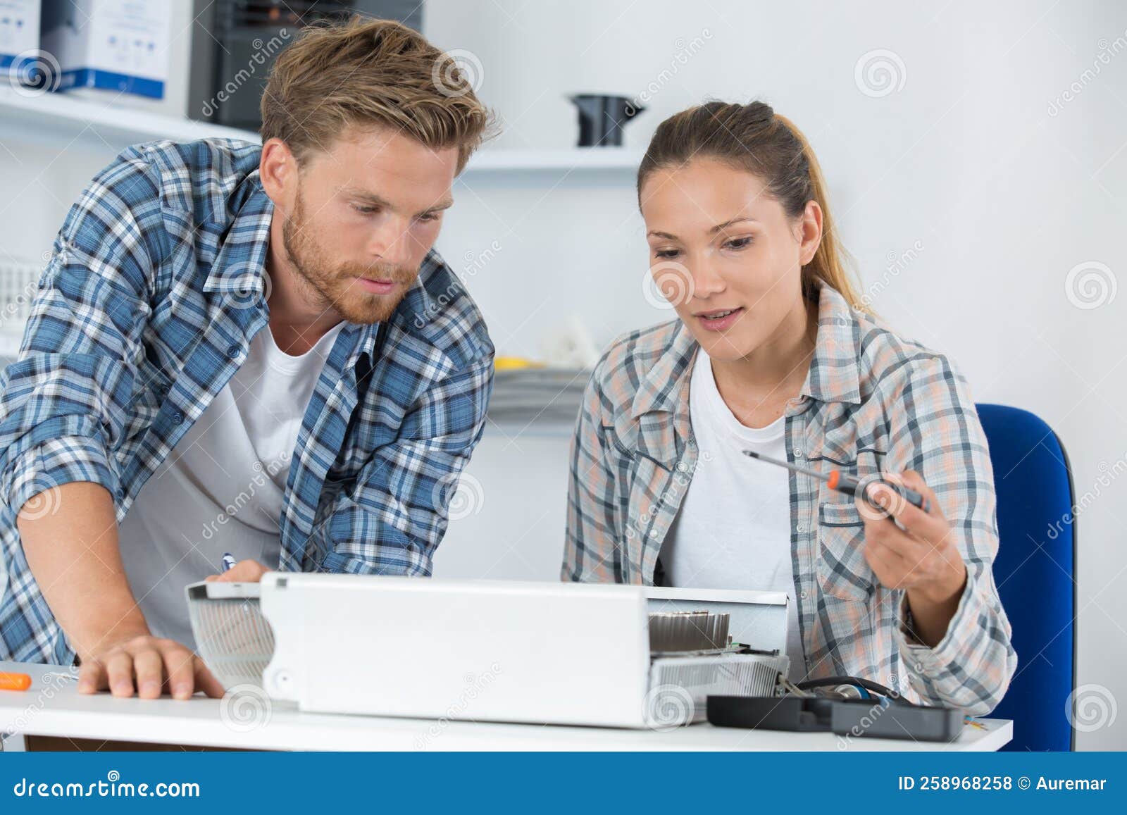 Young Technician Asking Advice from Colleague Stock Photo - Image of ...