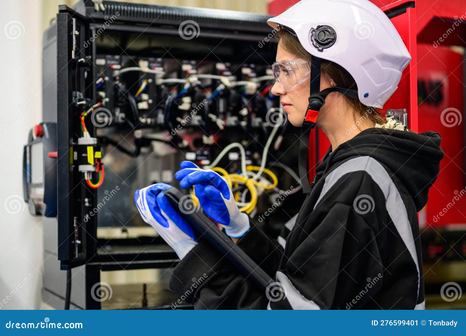 Young Technician Checking and Repairing Part of Automatic Machine Stock ...