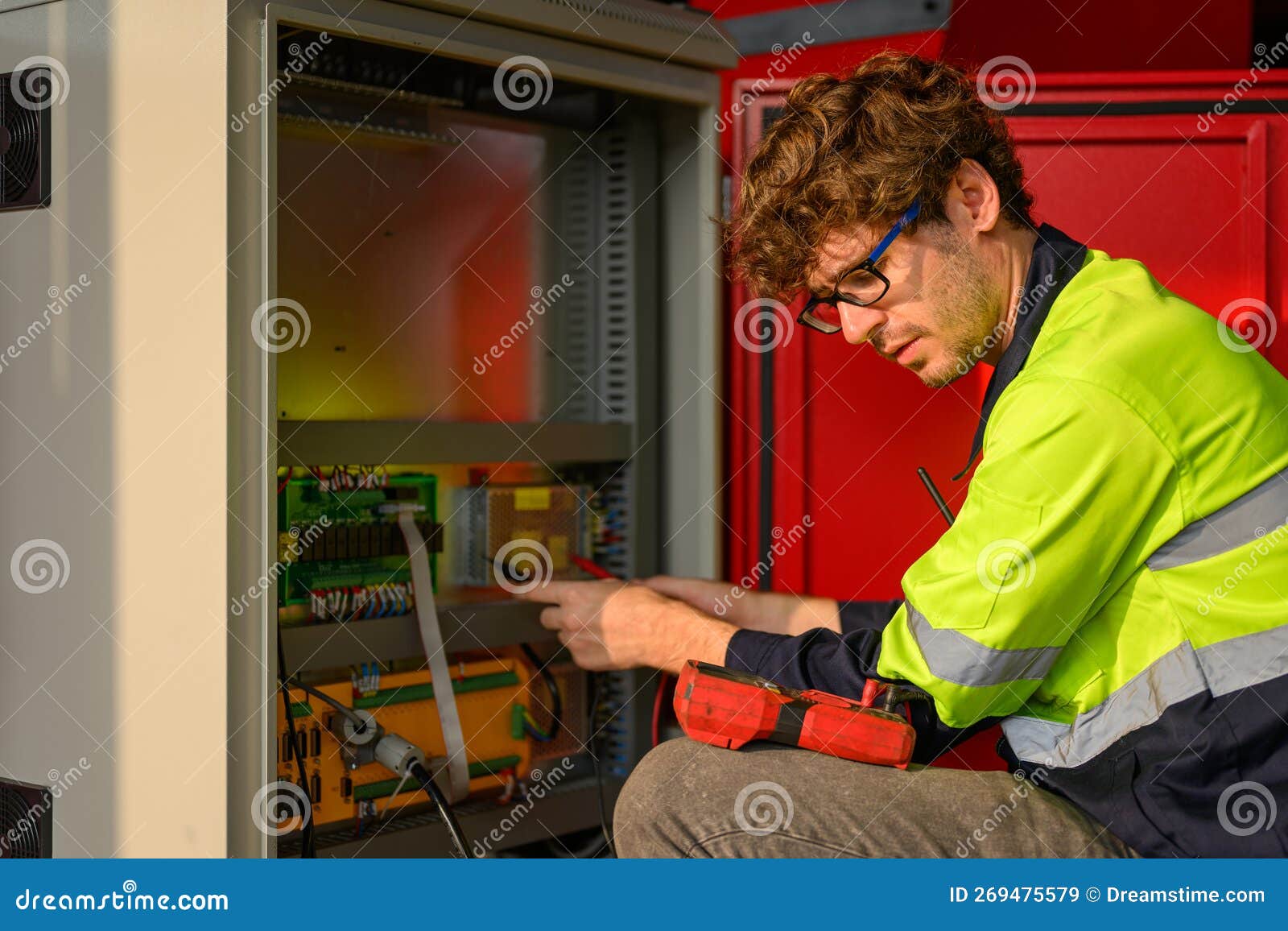 Young Technician Engineer Checking and Repairing Machine Stock Image ...