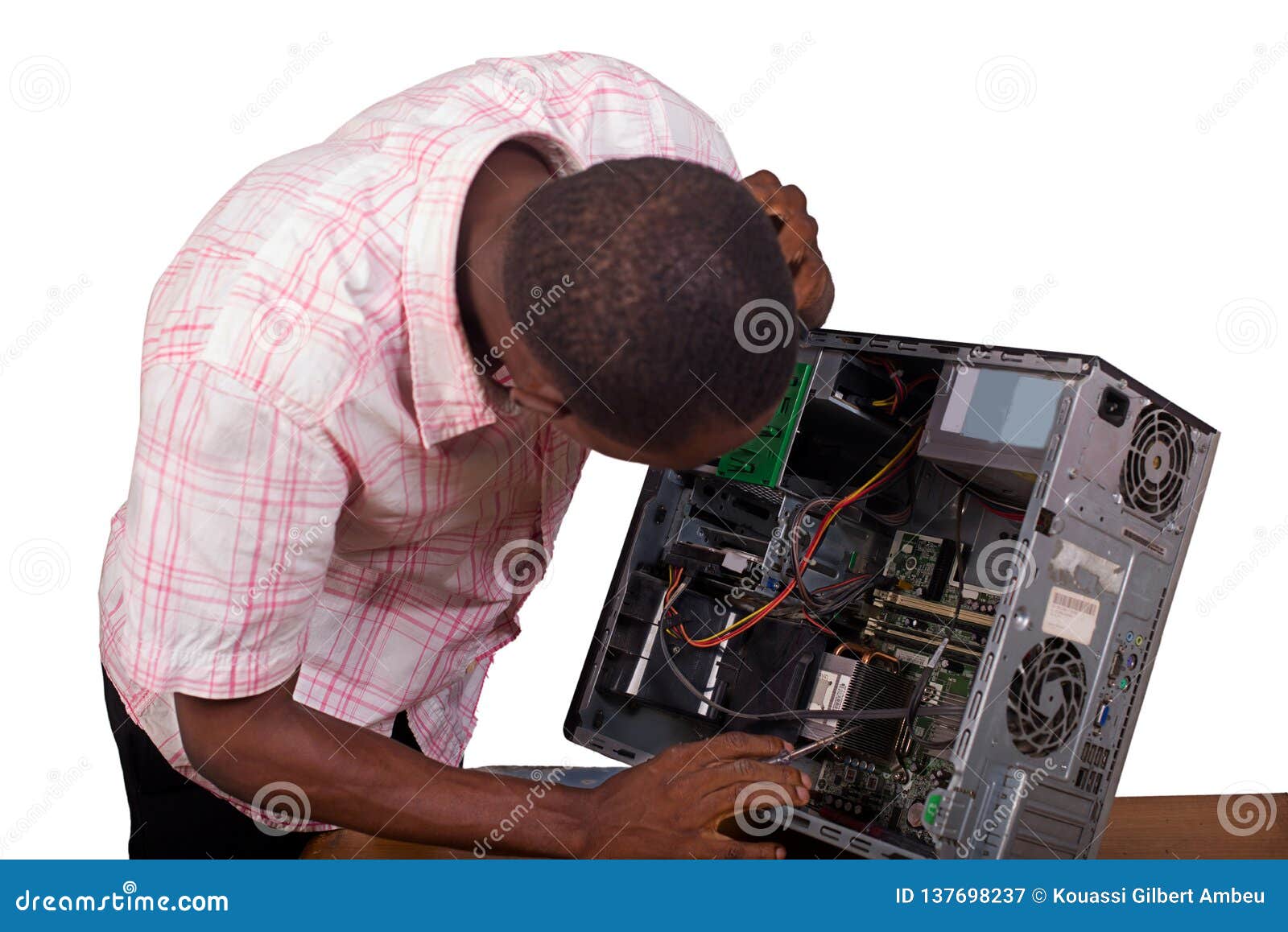 Young Technician Looks at and Repairs a Broken Computer Stock Image ...