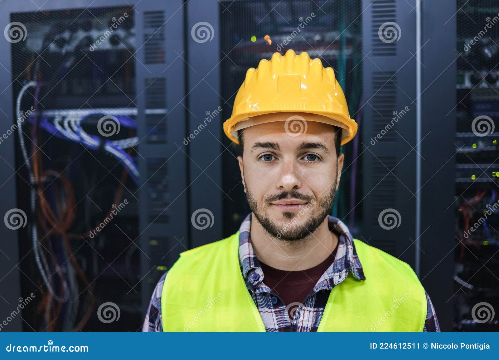Young Technician Man Looking at Camera while Working Inside Big Data ...