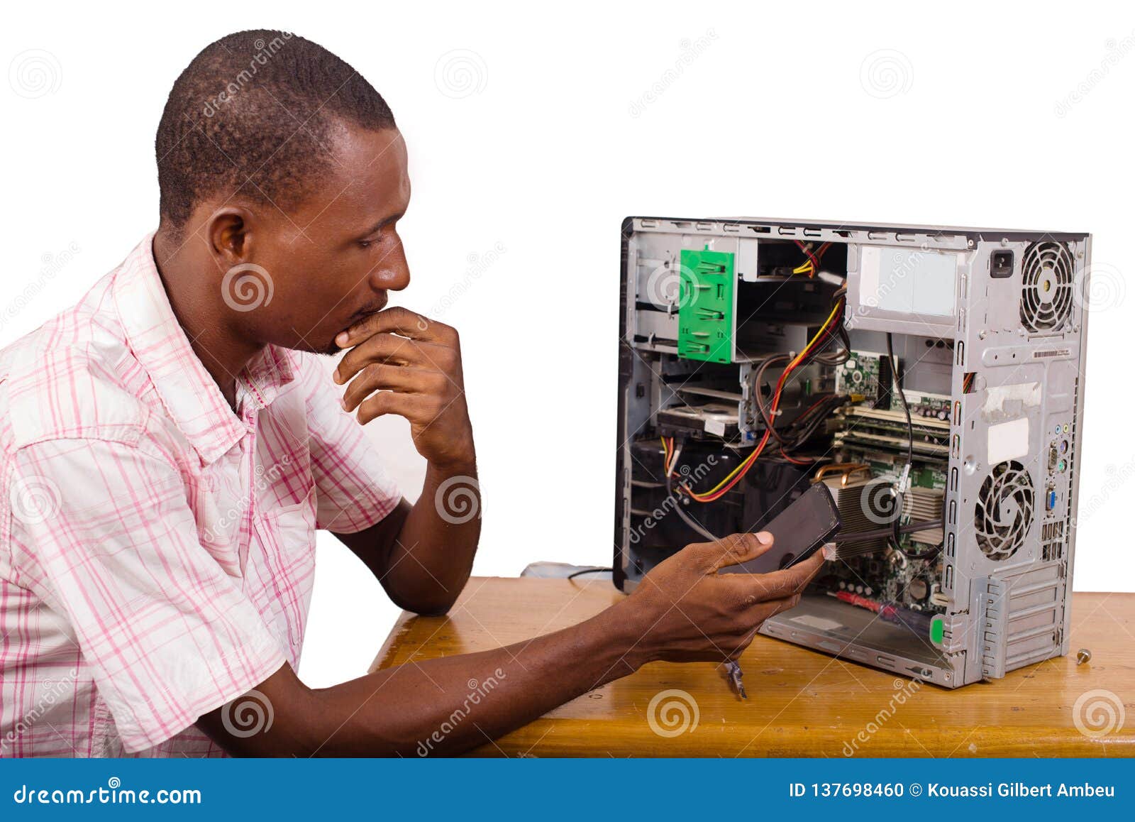 Young Technician Repairing a Computer Stock Photo - Image of device ...