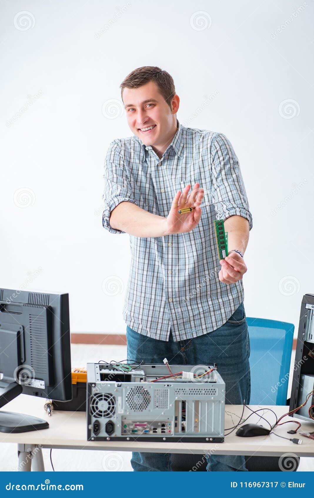The Young Technician Repairing Computer in Workshop Stock Image - Image ...