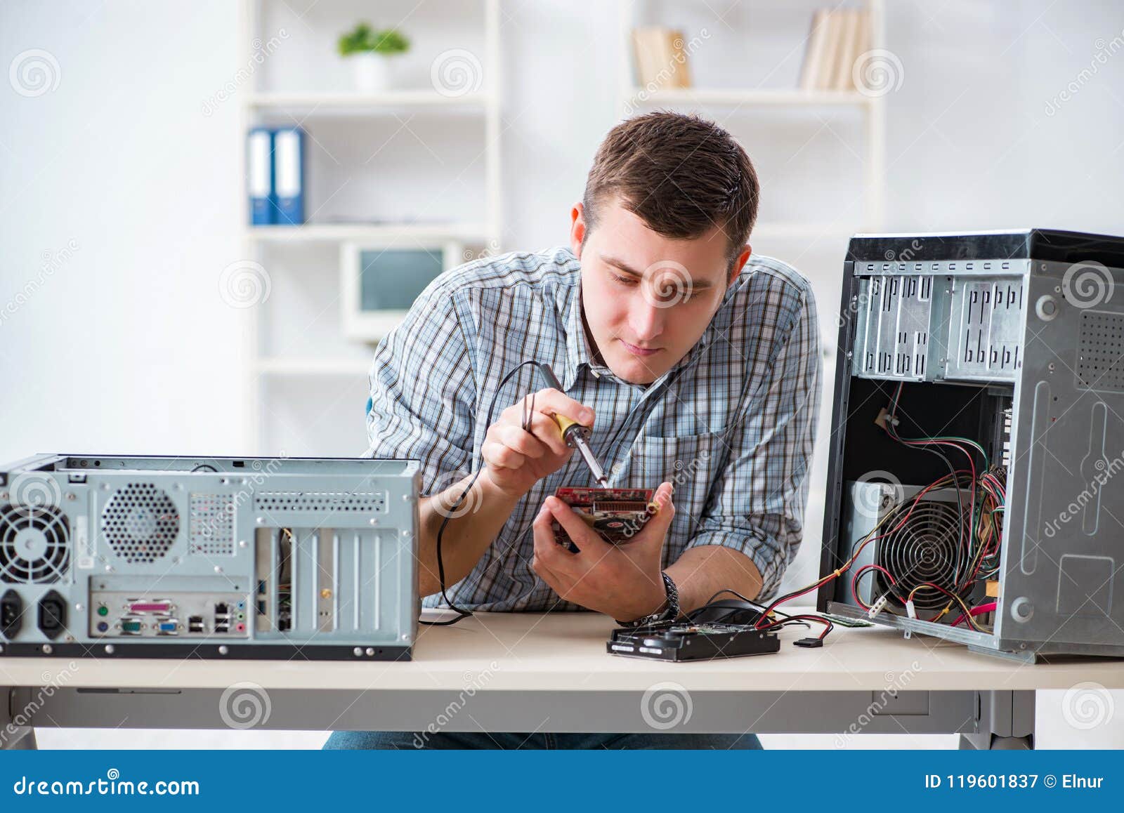 The Young Technician Repairing Computer in Workshop Stock Image - Image ...