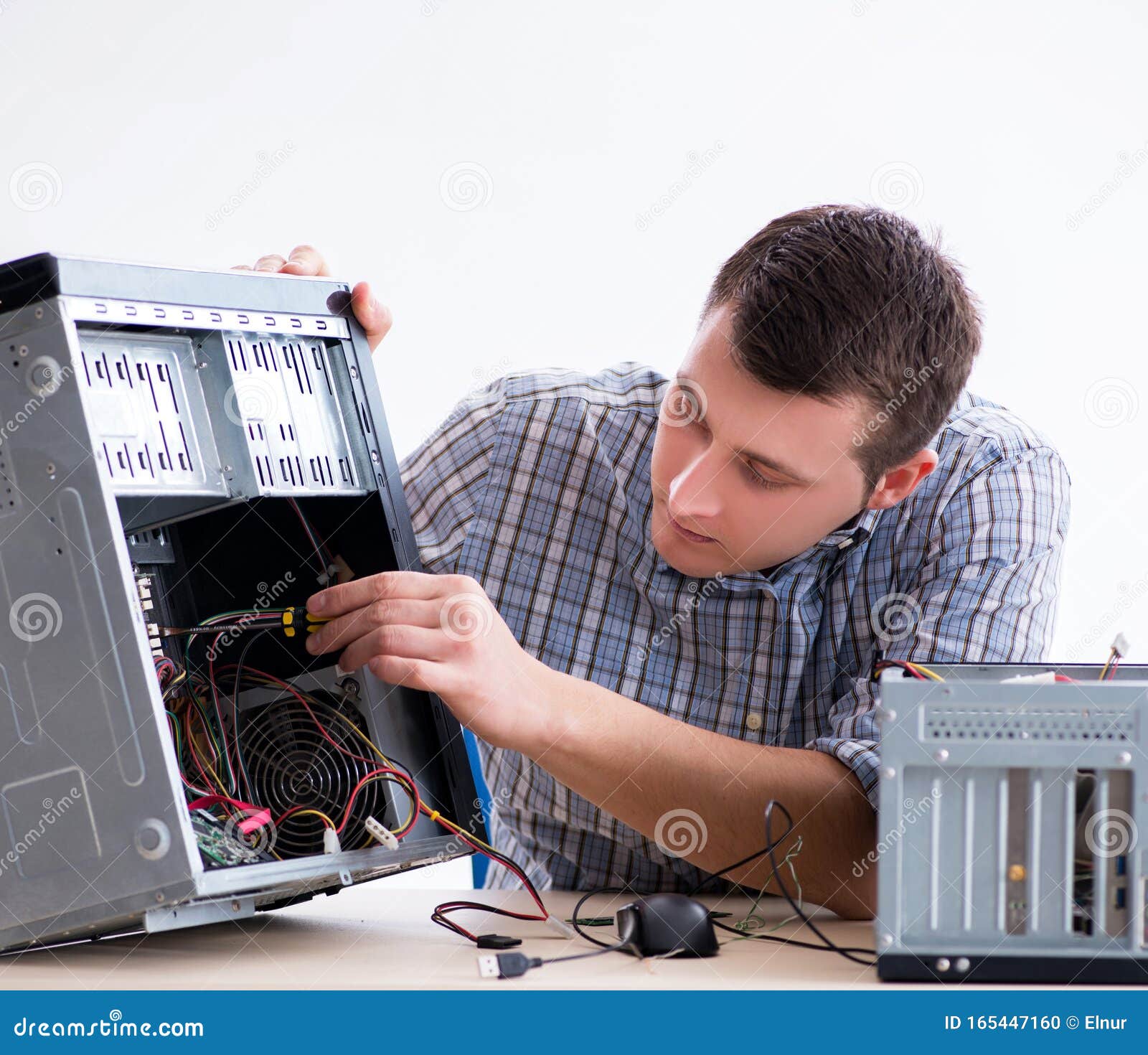 Young Technician Repairing Computer in Workshop Stock Photo - Image of ...
