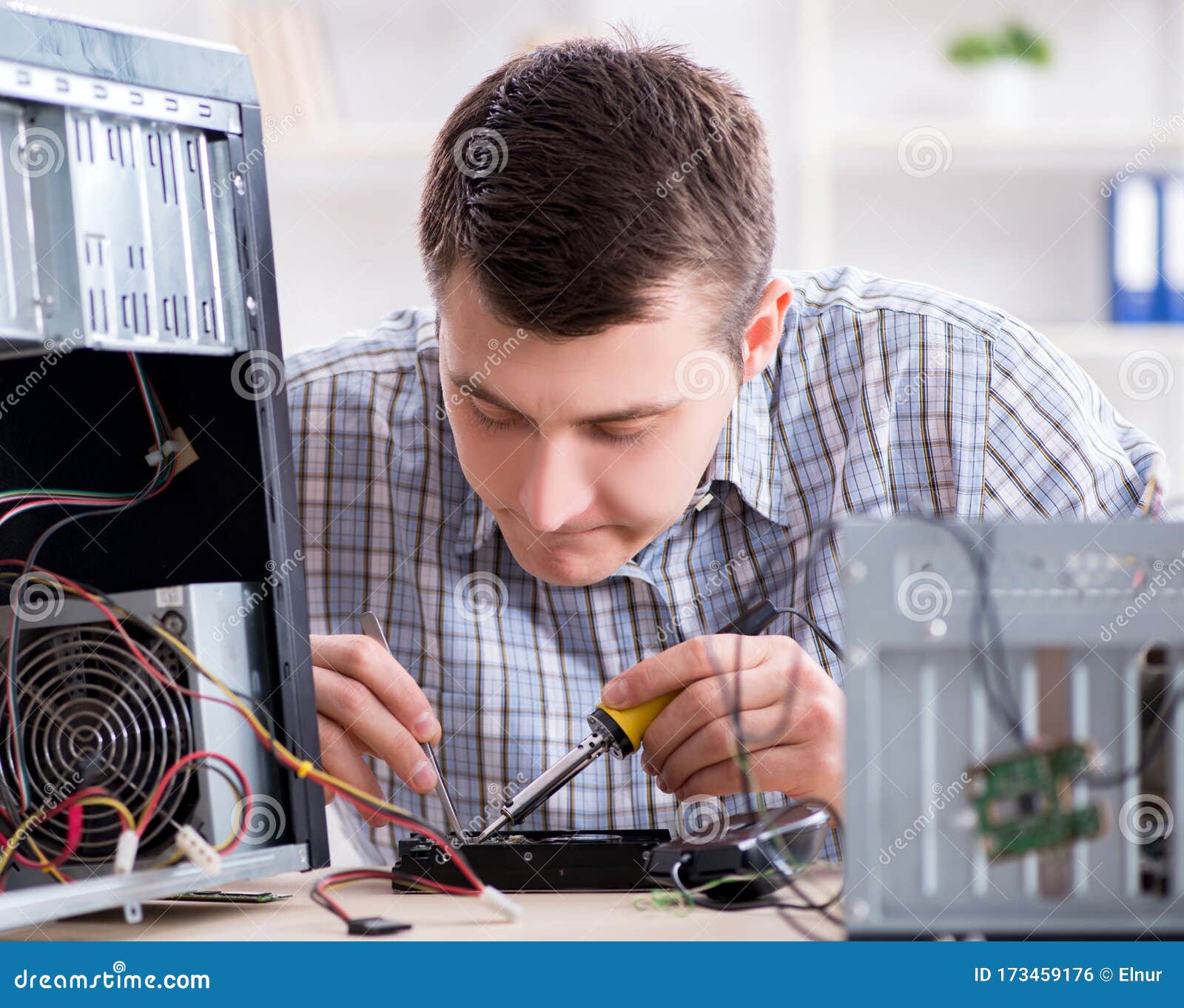 Young Technician Repairing Computer in Workshop Stock Photo - Image of ...