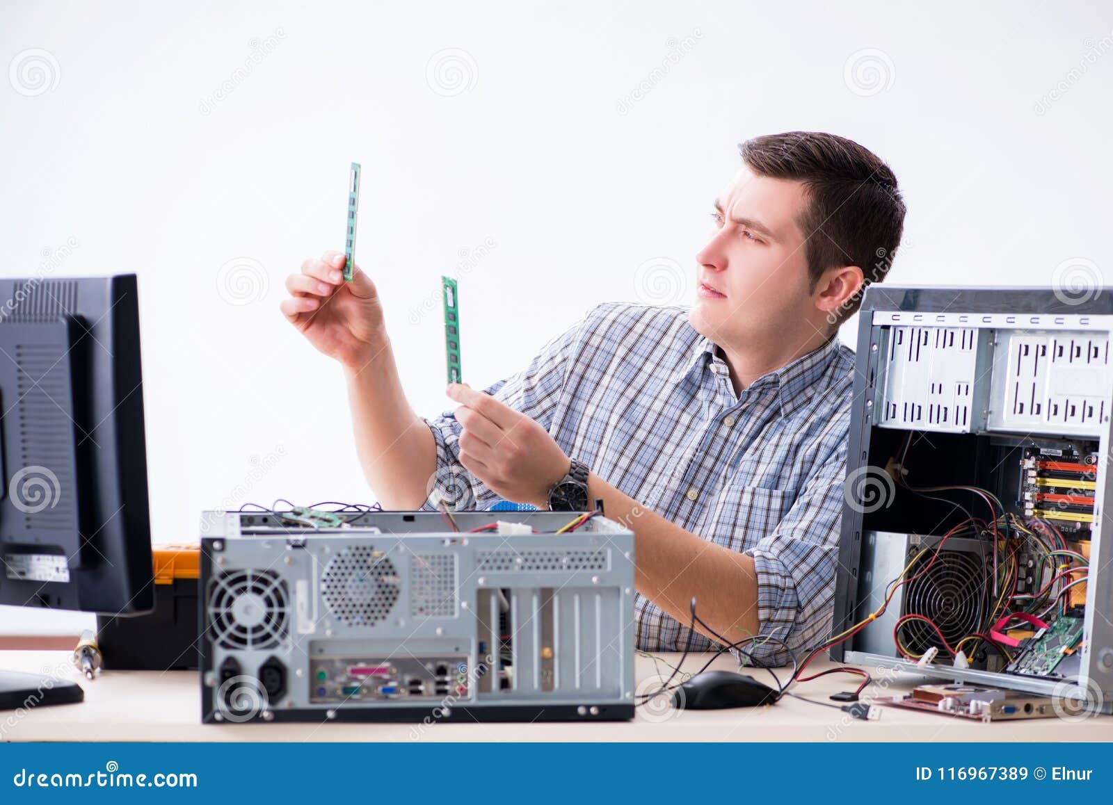 The Young Technician Repairing Computer in Workshop Stock Image - Image ...