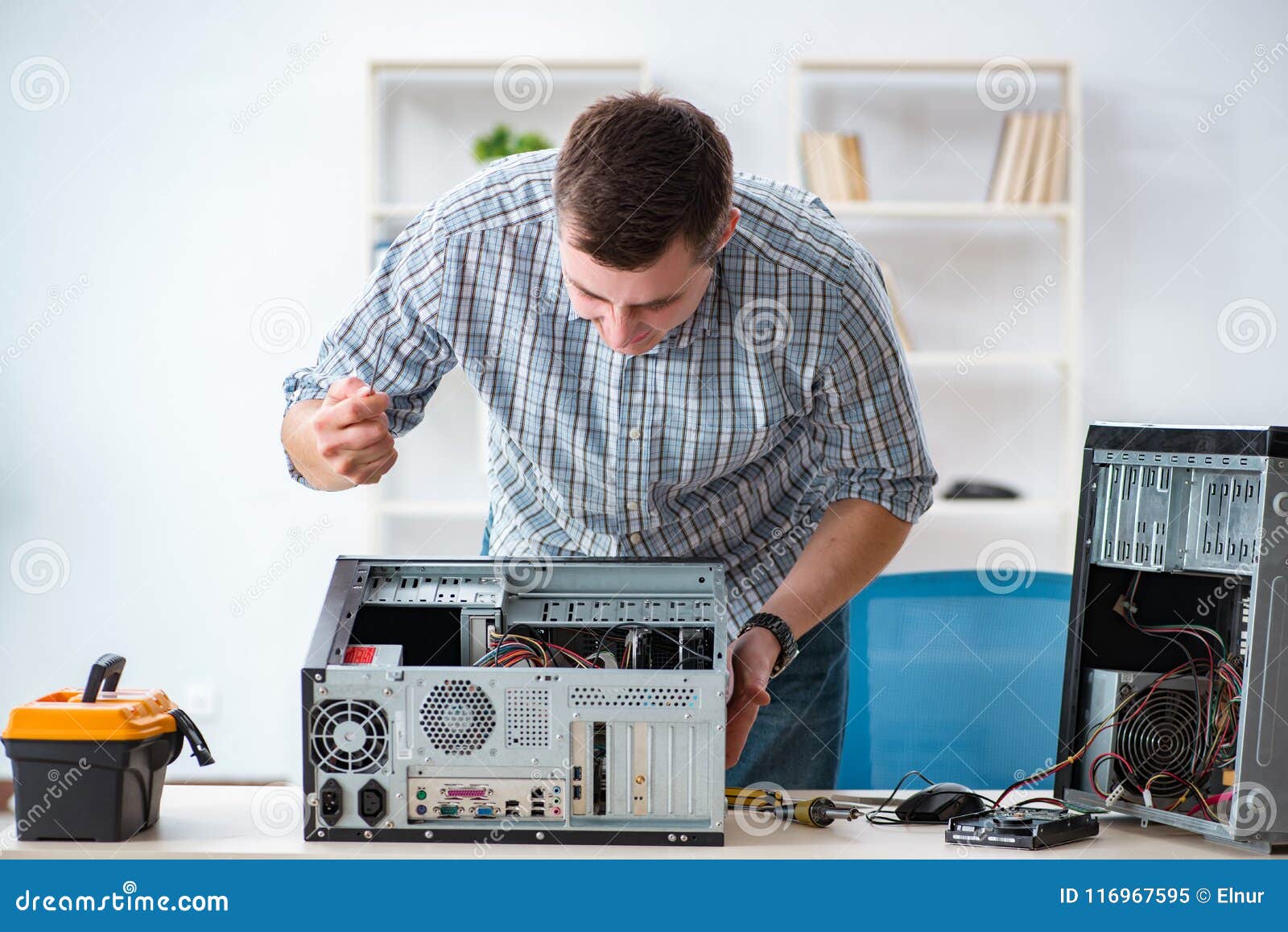 The Young Technician Repairing Computer in Workshop Stock Image - Image ...