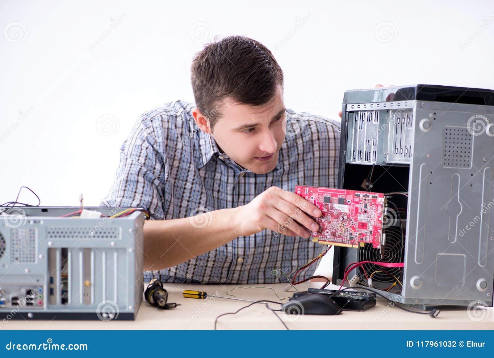 The Young Technician Repairing Computer in Workshop Stock Photo - Image ...