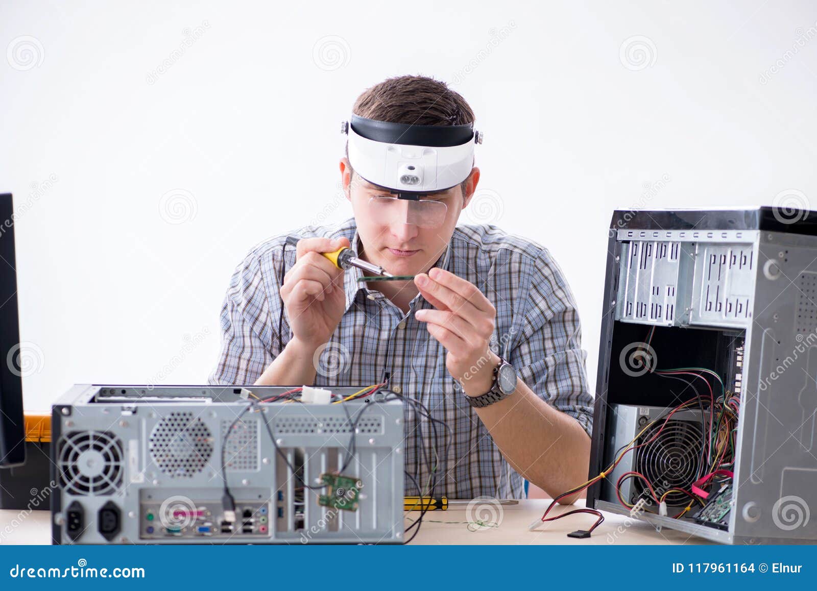 The Young Technician Repairing Computer in Workshop Stock Photo - Image ...