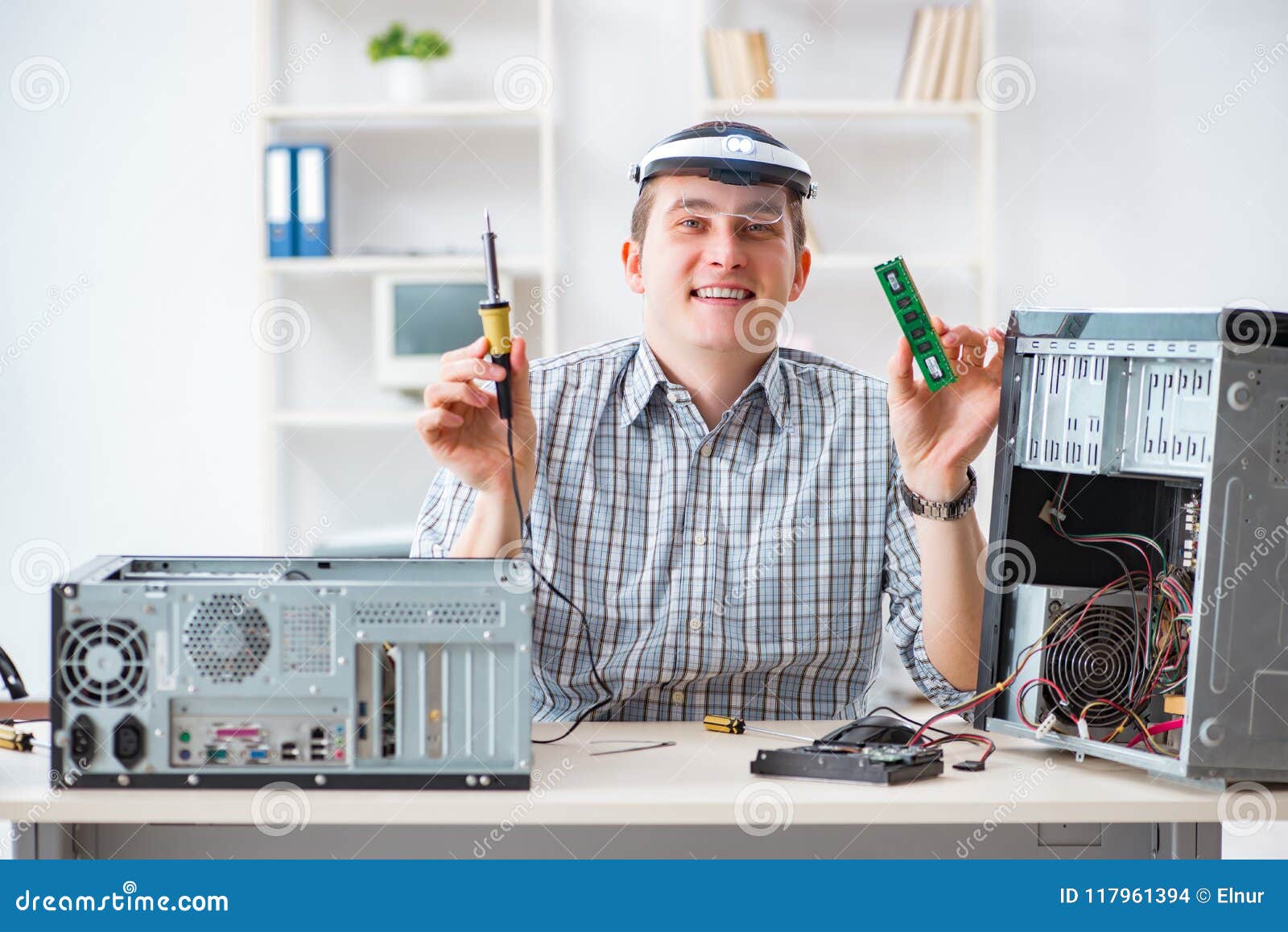 The Young Technician Repairing Computer in Workshop Stock Photo - Image ...