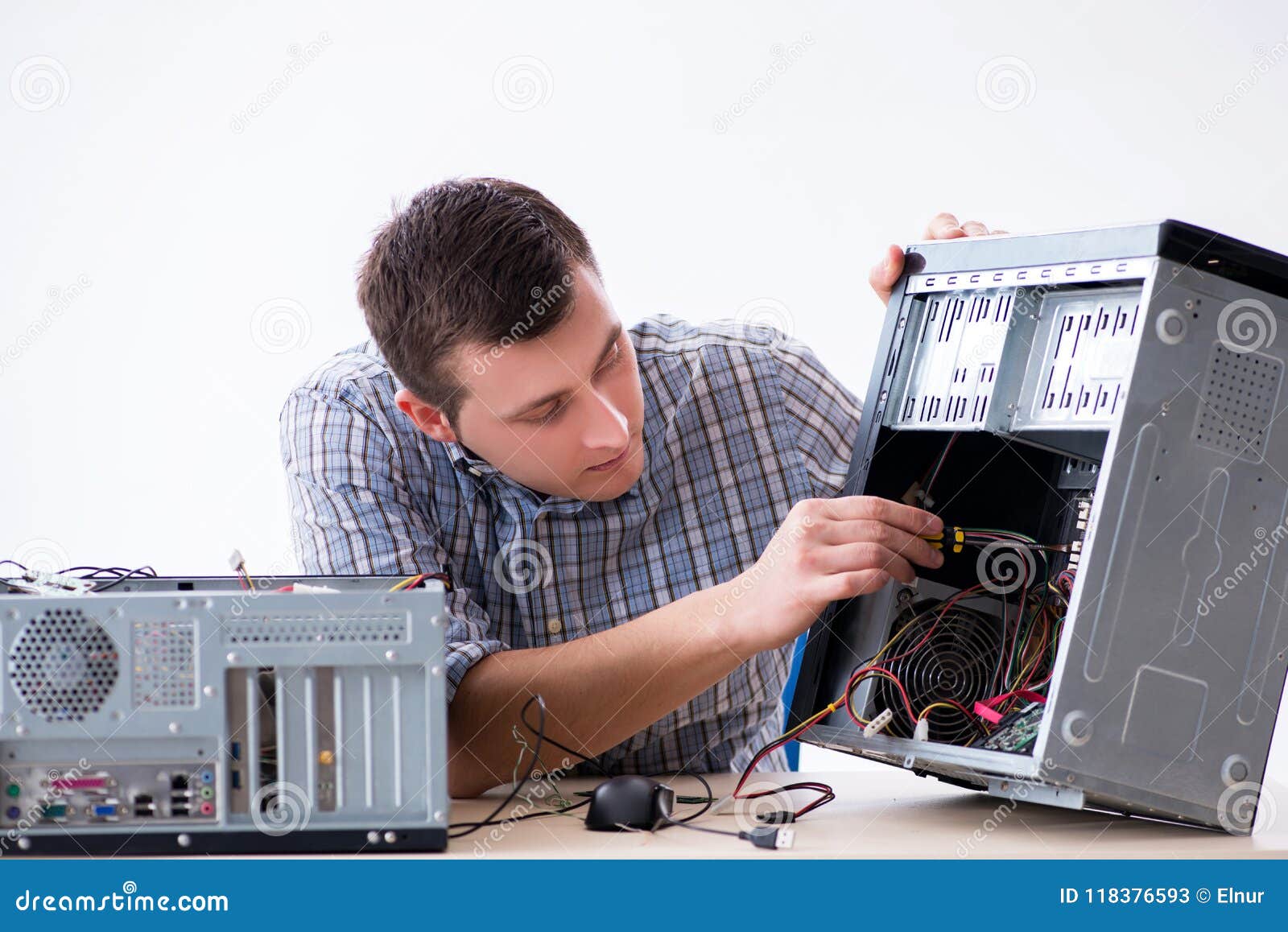 The Young Technician Repairing Computer in Workshop Stock Image - Image ...