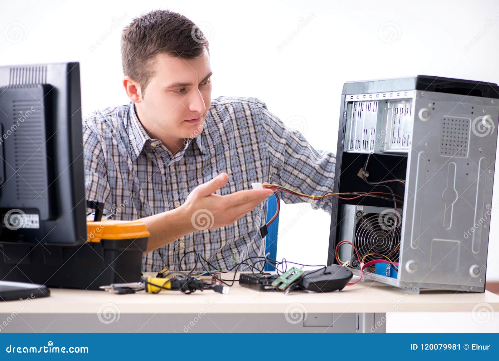 The Young Technician Repairing Computer in Workshop Stock Image - Image ...