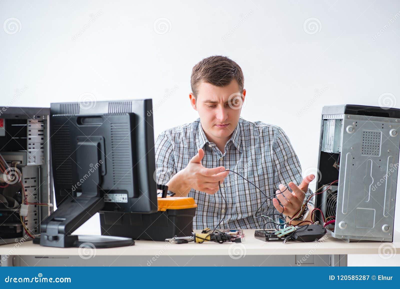 The Young Technician Repairing Computer in Workshop Stock Image - Image ...