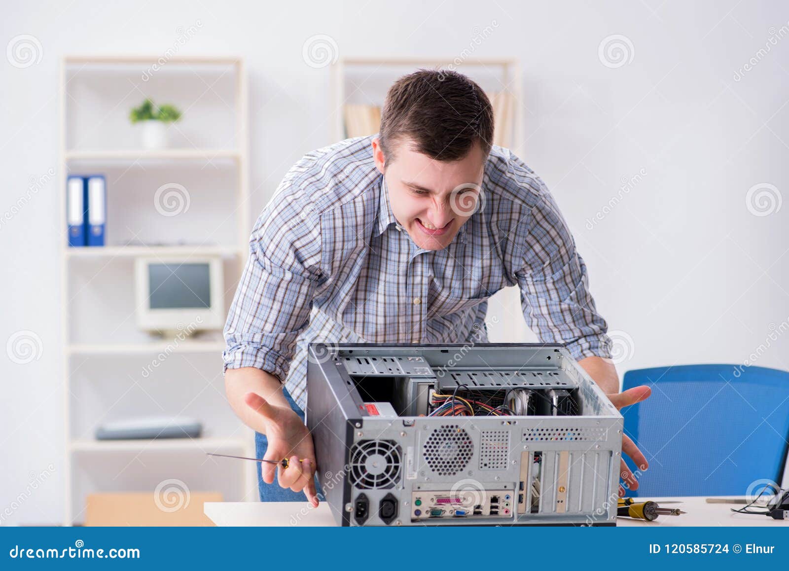 The Young Technician Repairing Computer in Workshop Stock Photo - Image ...