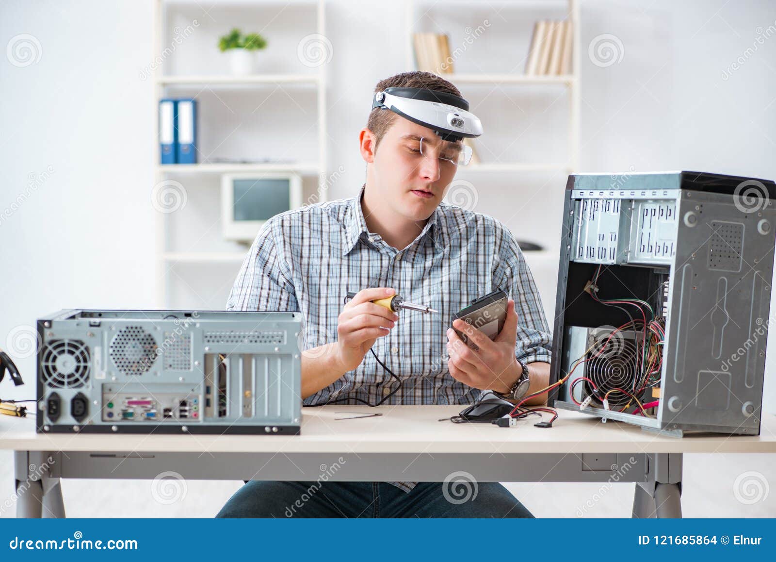 The Young Technician Repairing Computer in Workshop Stock Photo - Image ...