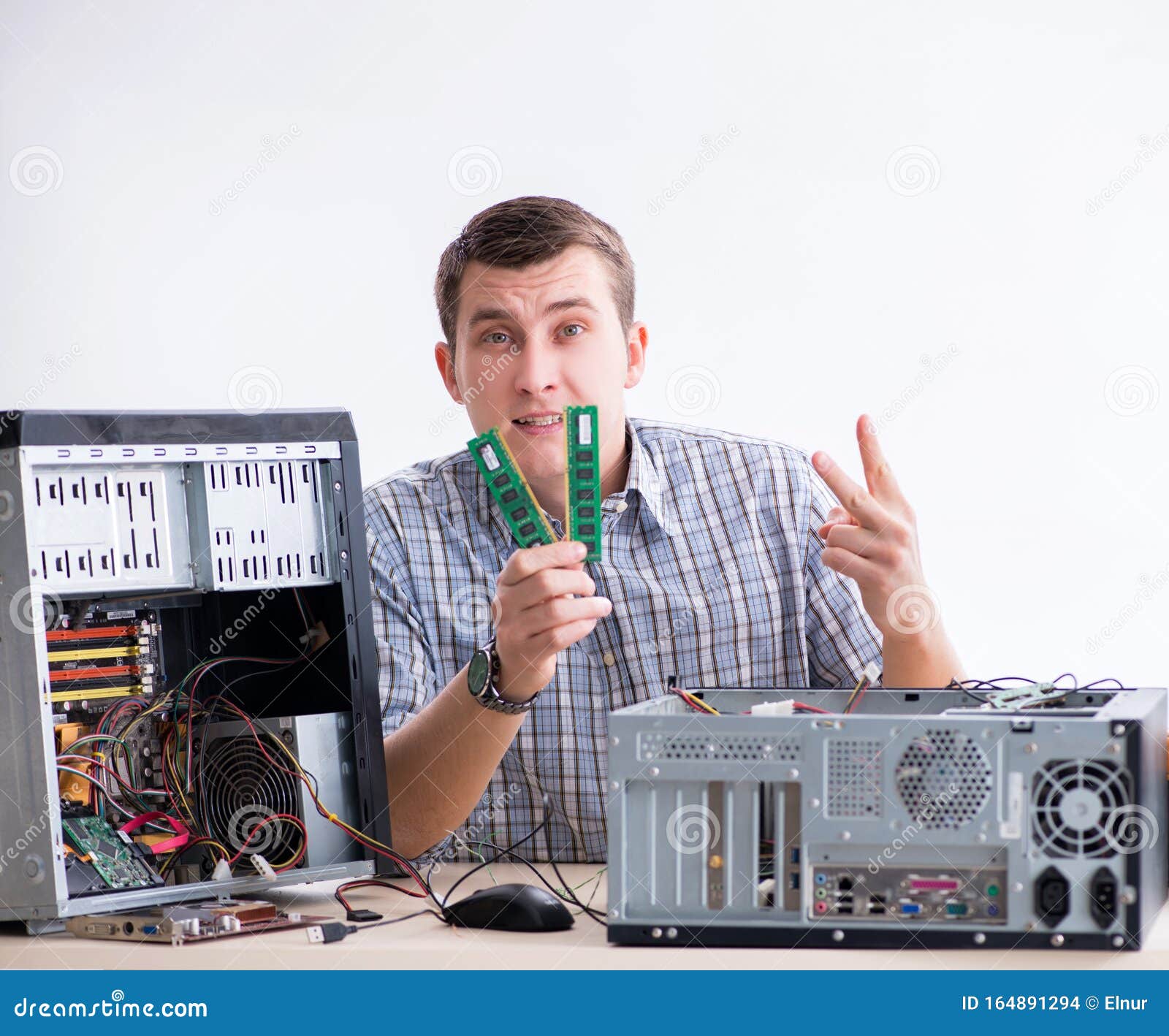 Young Technician Repairing Computer in Workshop Stock Photo - Image of ...