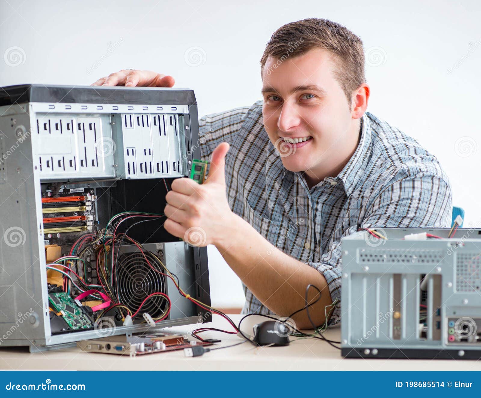 Young Technician Repairing Computer in Workshop Stock Photo - Image of ...