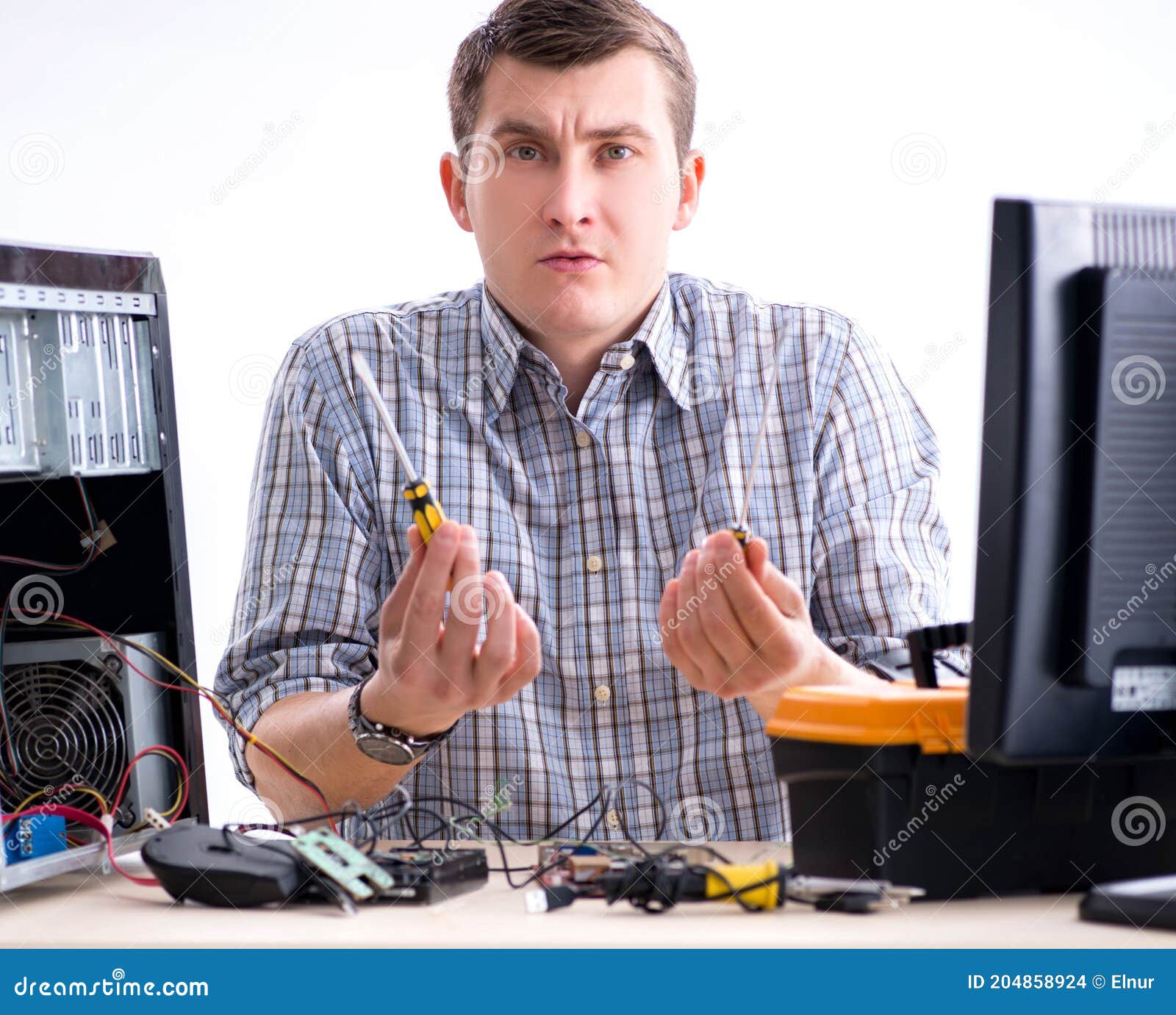 Young Technician Repairing Computer in Workshop Stock Photo - Image of ...
