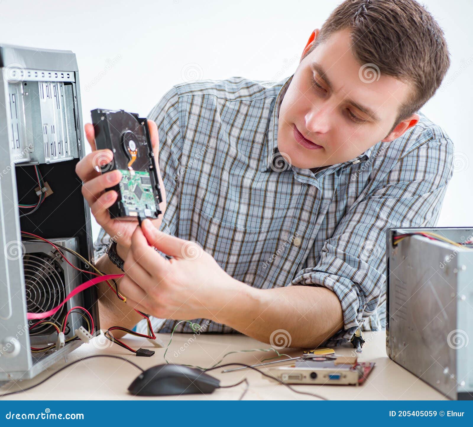 Young Technician Repairing Computer in Workshop Stock Image - Image of ...