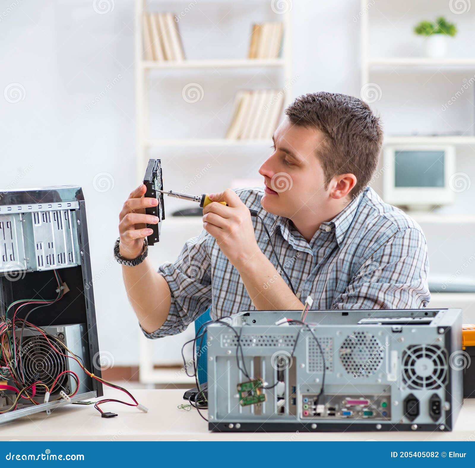 Young Technician Repairing Computer in Workshop Stock Photo - Image of ...