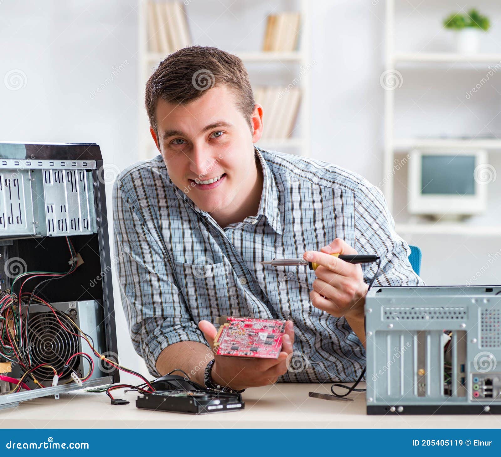 Young Technician Repairing Computer in Workshop Stock Image - Image of ...