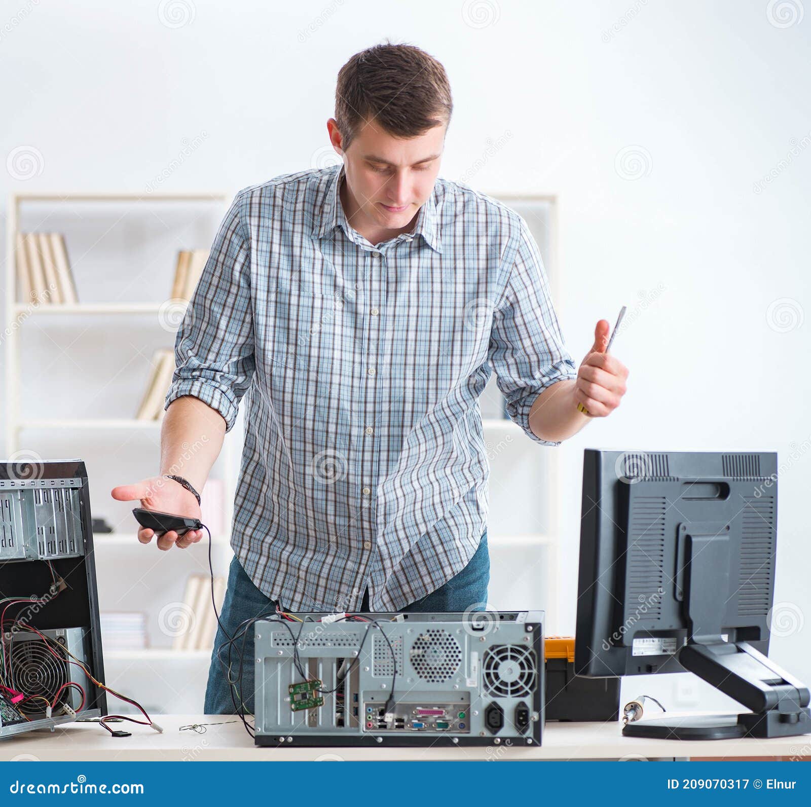 Young Technician Repairing Computer in Workshop Stock Image - Image of ...