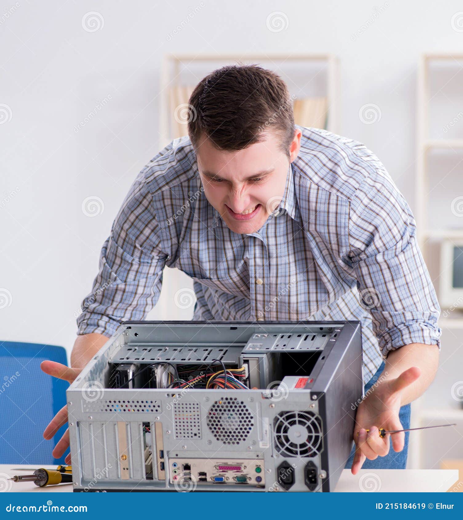 Young Technician Repairing Computer in Workshop Stock Image - Image of ...
