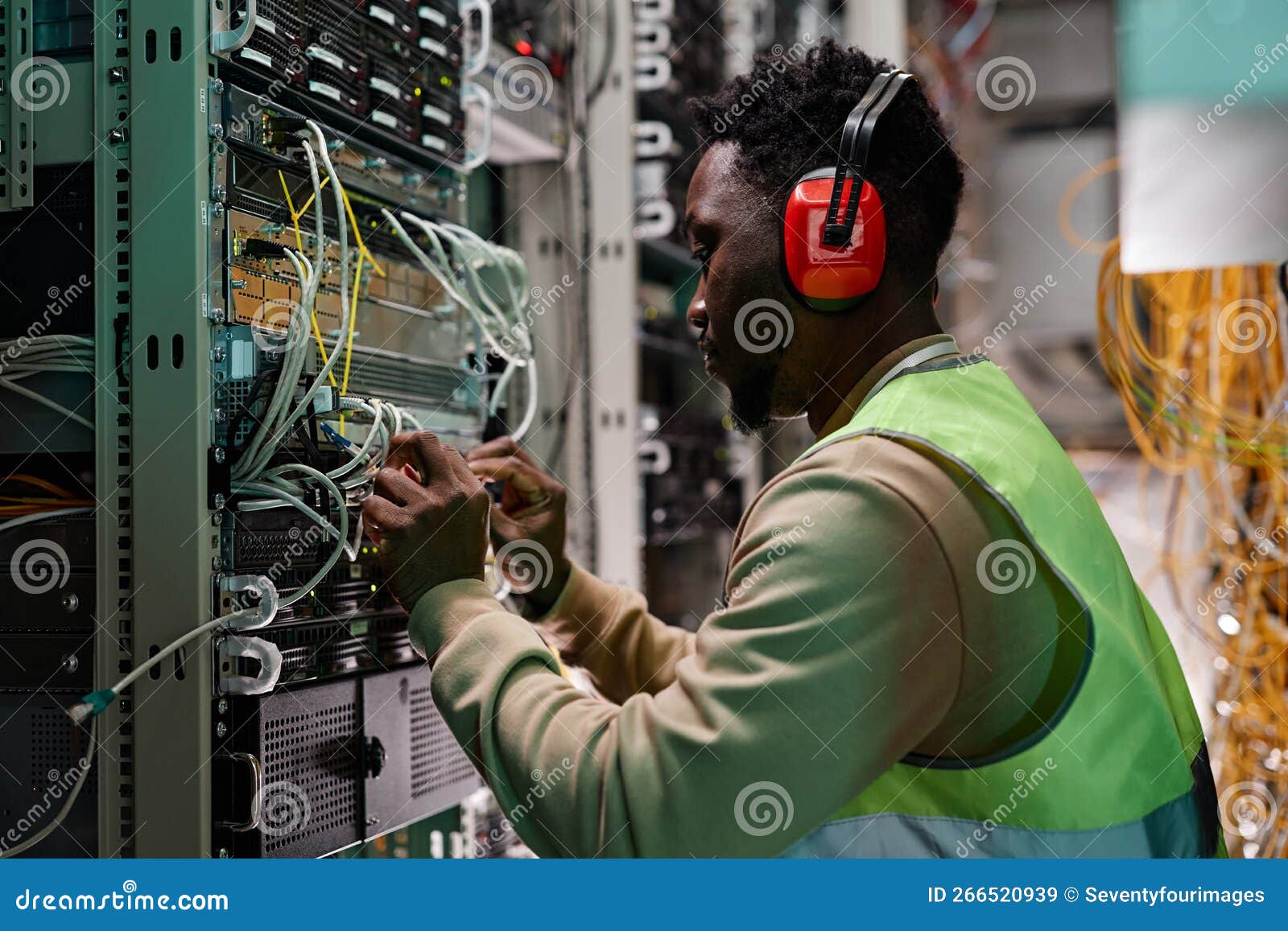 Young Technician Setting Up Network and Wearing Protective Workwear ...